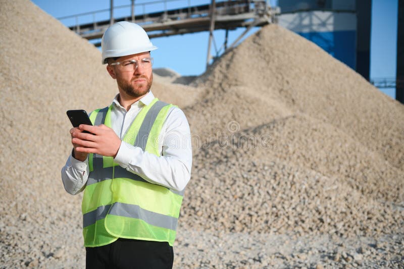 An Engineer at a Crushed Stone or Gravel Plant. Stone Mining Stock ...