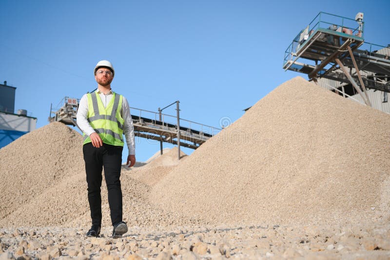 An Engineer at a Crushed Stone or Gravel Plant. Stone Mining Stock ...