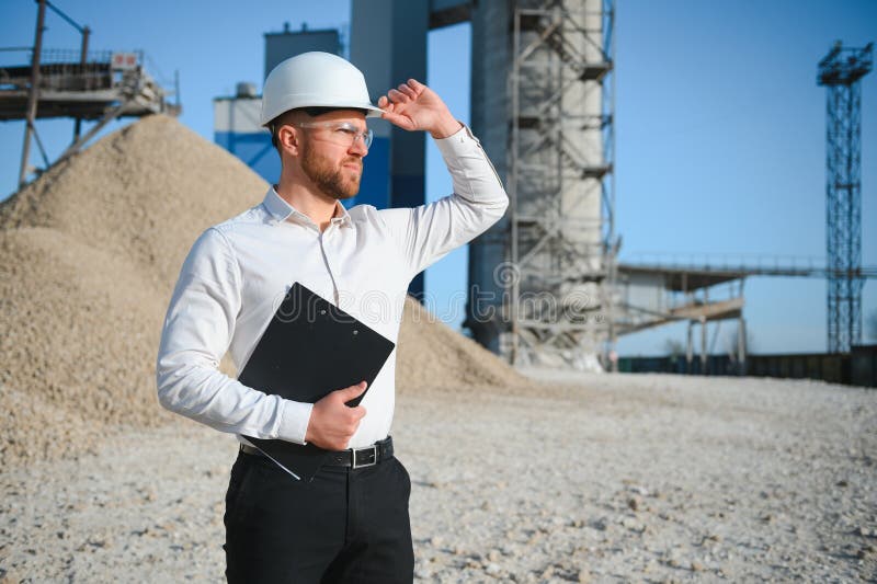 An Engineer at a Crushed Stone or Gravel Plant. Stone Mining Stock ...