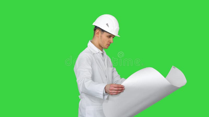 Engineer Dancing with a Blueprint Being in a Good Mood on a Green ...