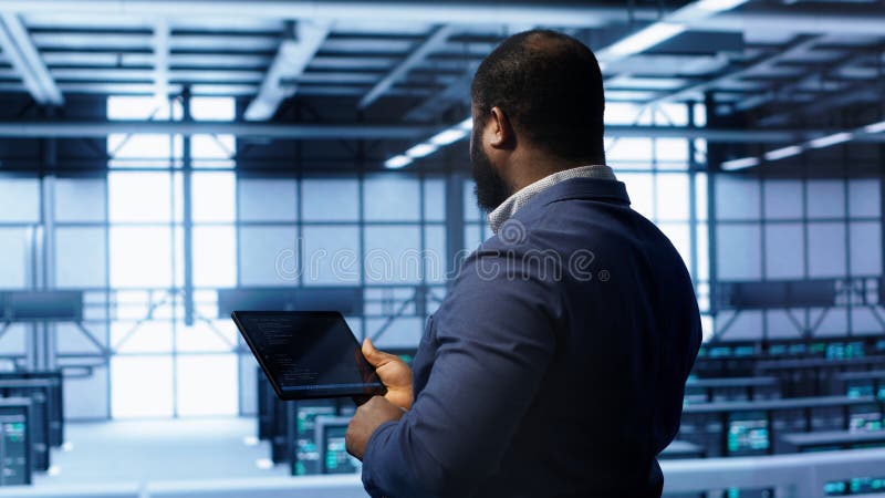 Engineer In Data Center Fixing Errors Affecting Server Rows Rigs Stock