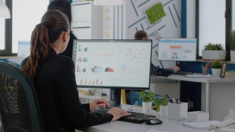 Engineer Designing a Blueprint on a Laptop, Typing Design Ideas and ...