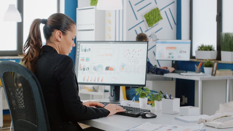 Engineer Designing Data Charts on Computer for Business Project Stock ...