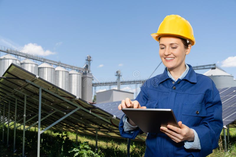 Engineer with Digital Tablet on a Background of Power Line Tower. Stock ...