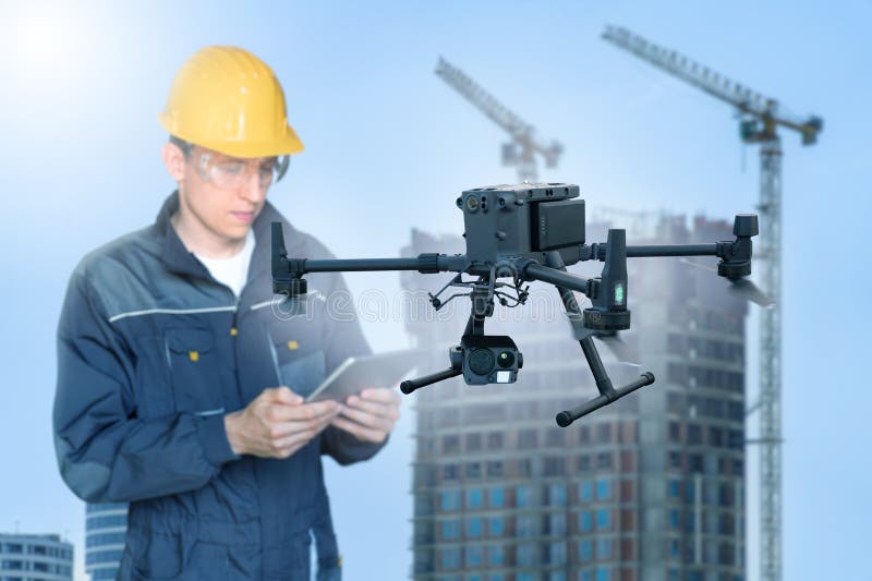 Engineer with Digital Tablet on a Background of Power Line Tower. Stock ...
