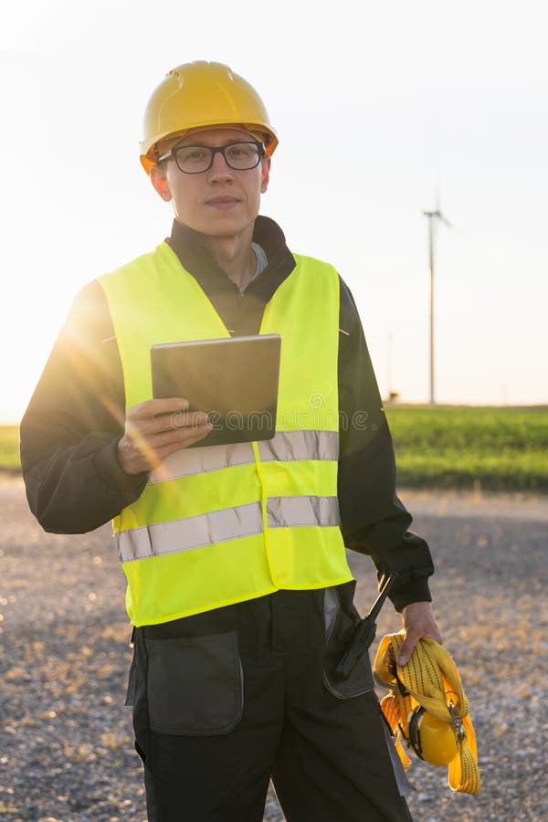 Engineer with Digital Tablet Controls Wind Turbines Stock Photo - Image ...