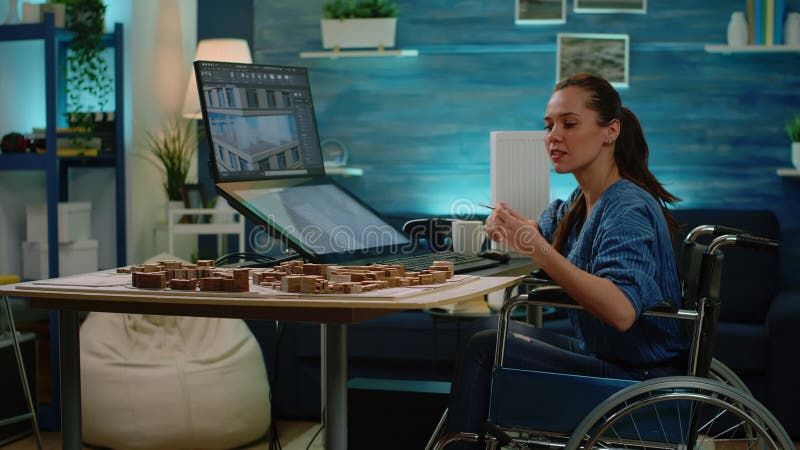 Engineer with Disability Using Touch Screen for Building Model Stock ...