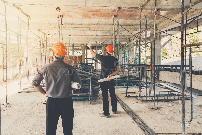 Engineer Discussing with Foreman about Project in Const Stock Photo ...