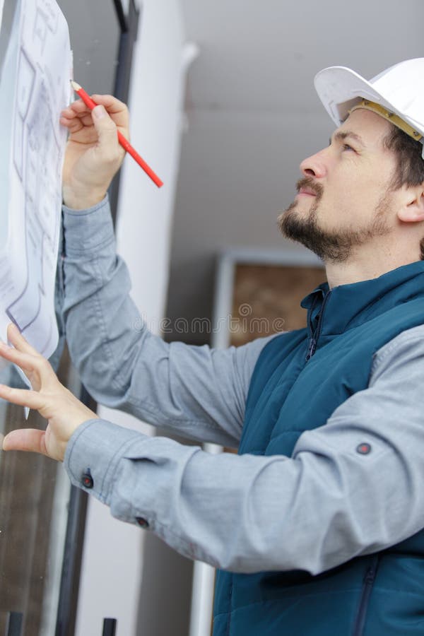 Engineer with Drawing Maintenance Work Stock Image - Image of blueprint ...