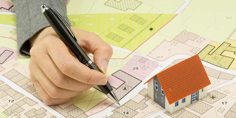 Engineer Drawing Over an Imaginary Cadastral Map of Territory and ...