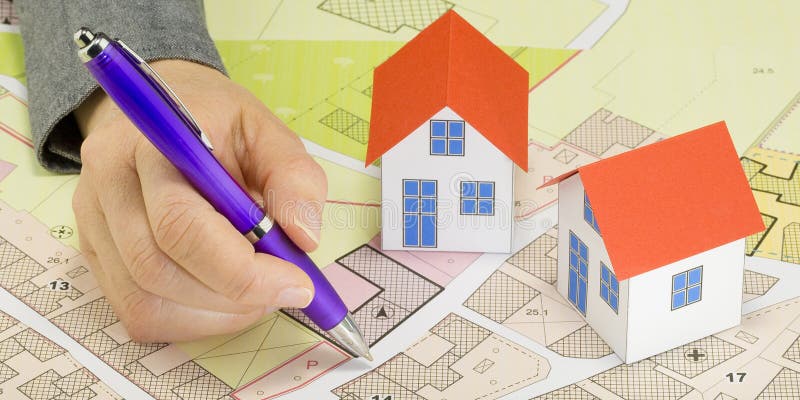 Engineer Drawing Over an Imaginary Cadastral Map of Territory and ...