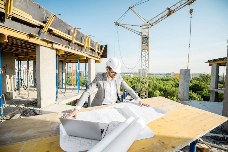 Engineer with Drawings on the Structure Stock Image - Image of ...
