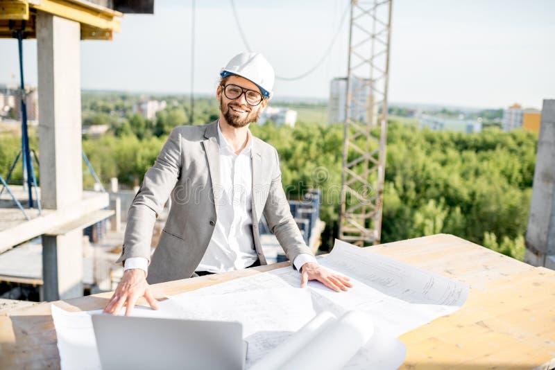 Engineer with Drawings on the Structure Stock Photo - Image of design ...
