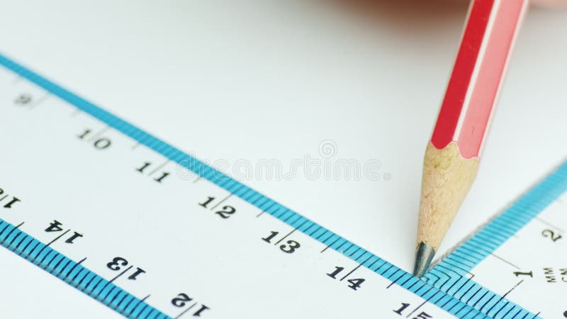 The Engineer Draws Parallel Lines in the Drawing with a Ruler and a ...