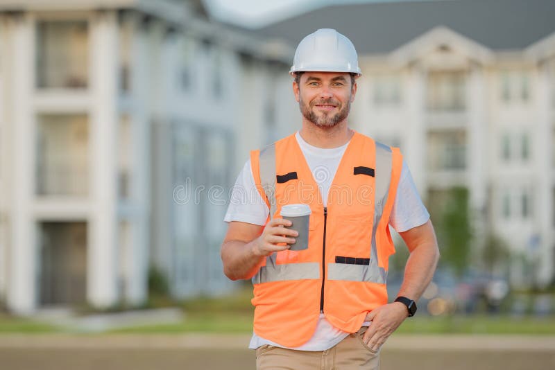 Engineer Drinking Take Away Coffee on Break. Builder on Site ...