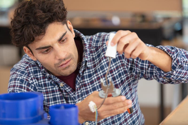 Electrician Examining a Electric Meter Stock Photo - Image of check ...