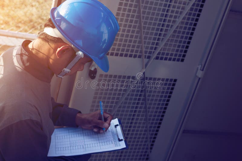 Engineer or Electrician Working on Checking and Maintenance Equipment ...