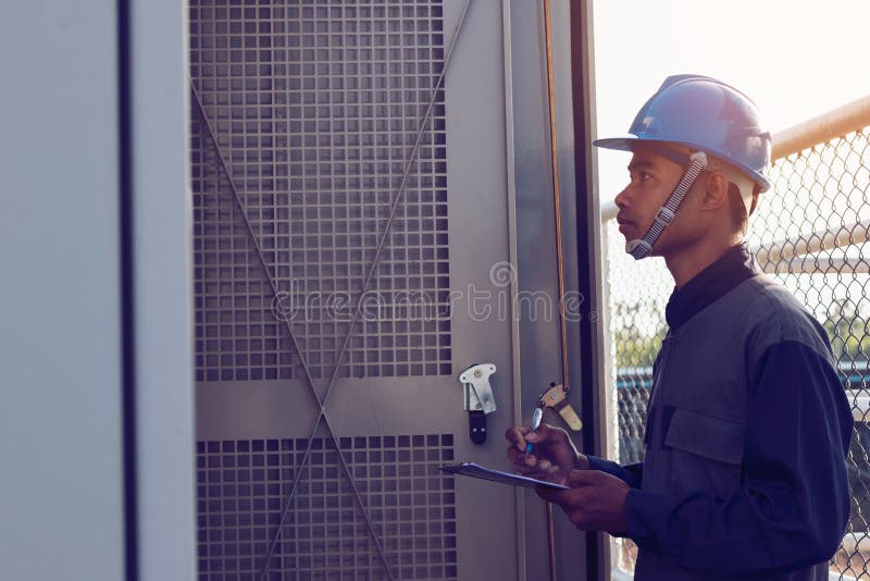Engineer or Electrician Working on Checking and Maintenance Equipment ...