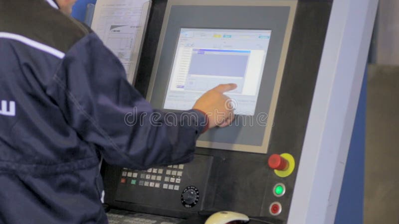 Engineer, Factory Worker Setting Up CNC Lathe Machine. Stock Footage ...