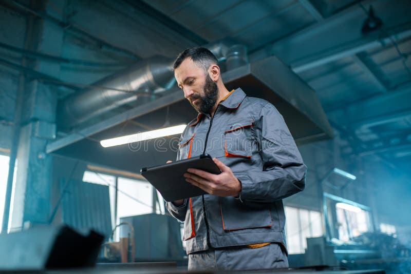 Worker with a Digital Tablet at the Plant Stock Photo - Image of ...