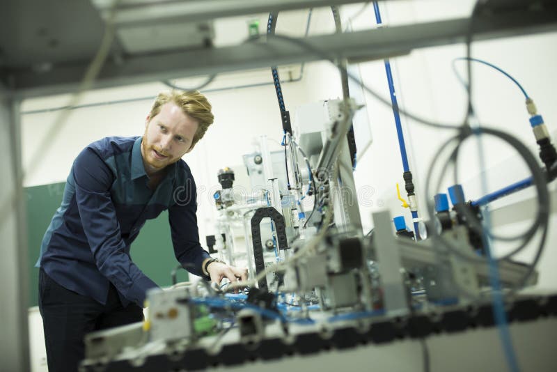 Engineer in the factory stock image. Image of expertise - 53119593