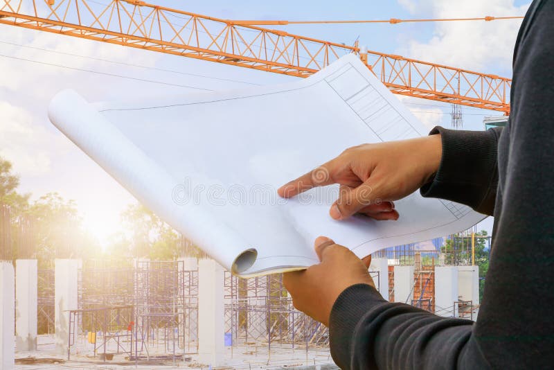 Engineer Finger Point on Paper Plan Blueprint in Check Building Stock ...