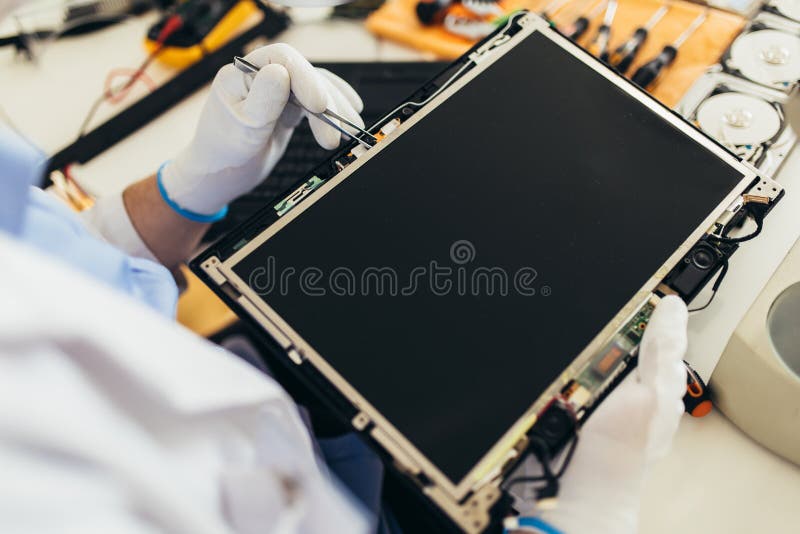 Engineer Fixing Broken Computer Equipment. Stock Image - Image of ...