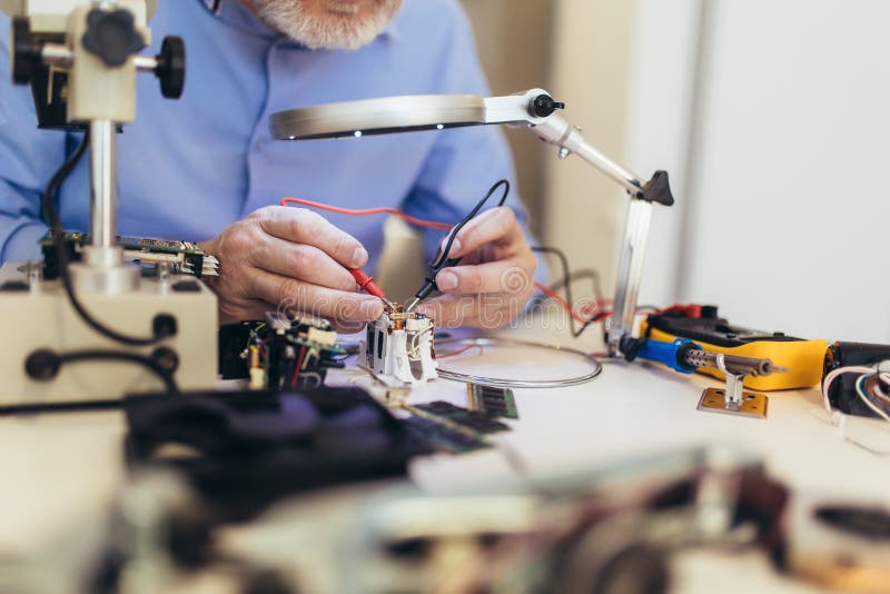Engineer Fixing Broken Computer Equipment. Stock Photo - Image of ...