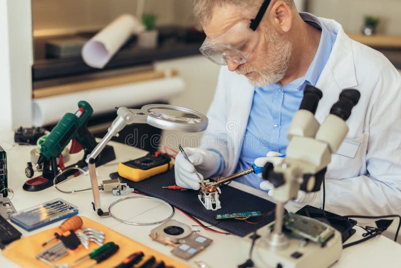 Engineer Fixing Broken Computer Equipment. Stock Photo - Image of ...