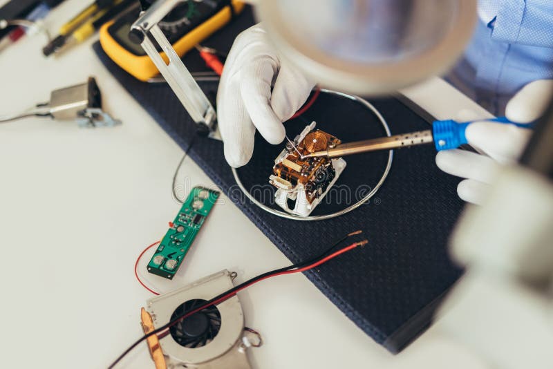 Engineer Fixing Broken Computer Equipment. Stock Photo - Image of ...