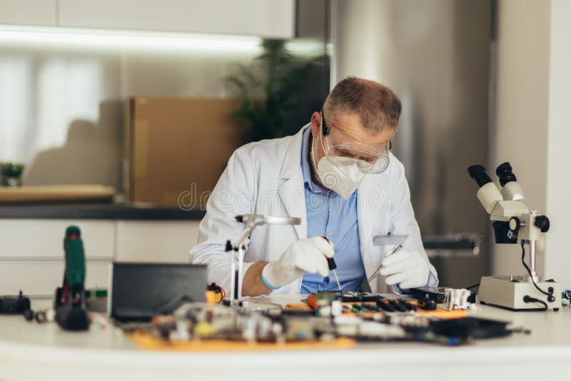 Engineer Fixing Broken Computer Equipment. Stock Photo - Image of ...