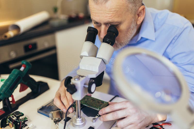 Engineer Fixing Broken Computer Equipment. Stock Image - Image of ...