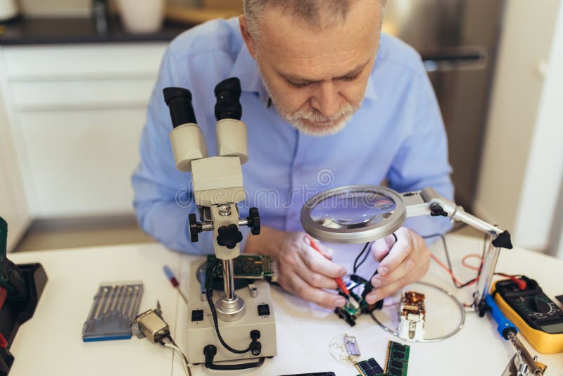 Engineer Fixing Broken Computer Equipment. Stock Photo - Image of ...
