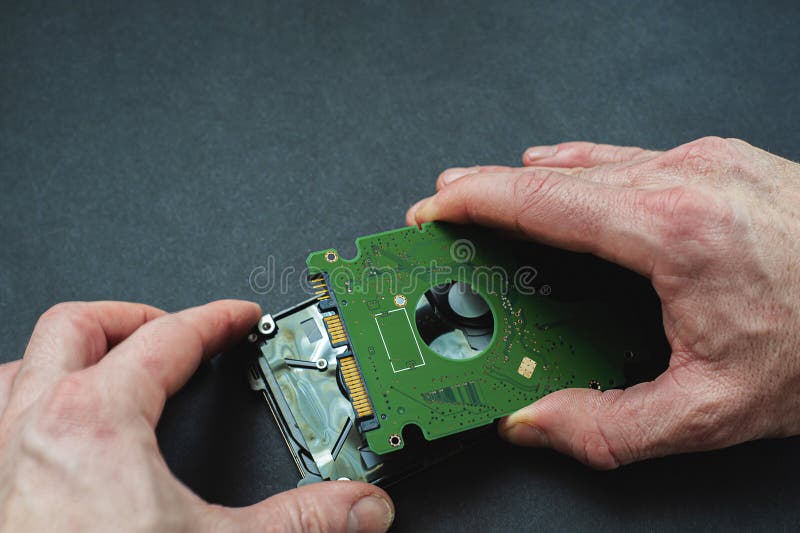 Engineer Fixing Broken Computer Hard Disc. Electronic Repair Shop ...