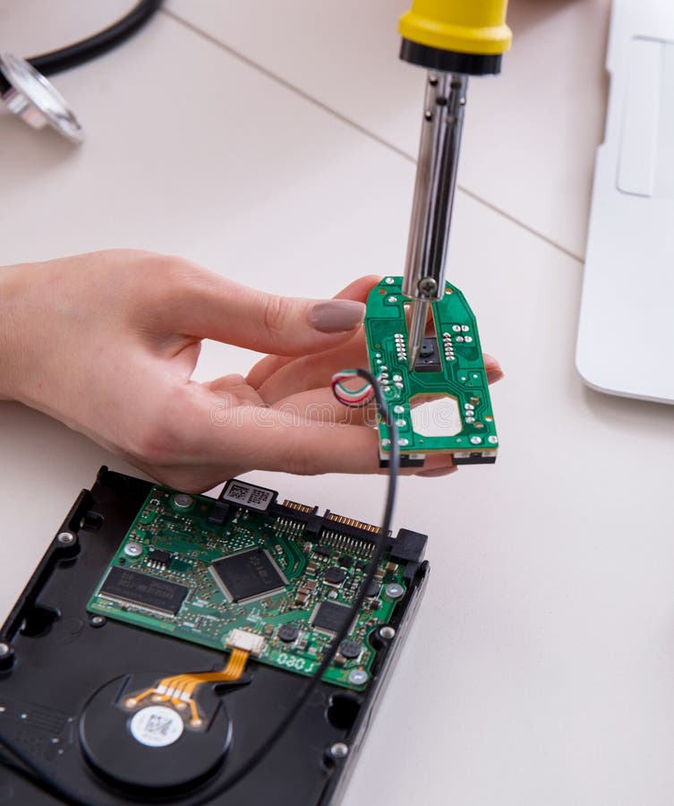 Engineer Fixing Broken Computer Hard Drive Stock Image - Image of ... Engineer Fixing Broken Computer Hard Drive Stock Image - Image of ...