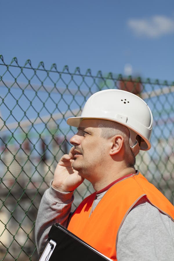 Engineer with a folder stock photo. Image of plan, clothing - 30908548