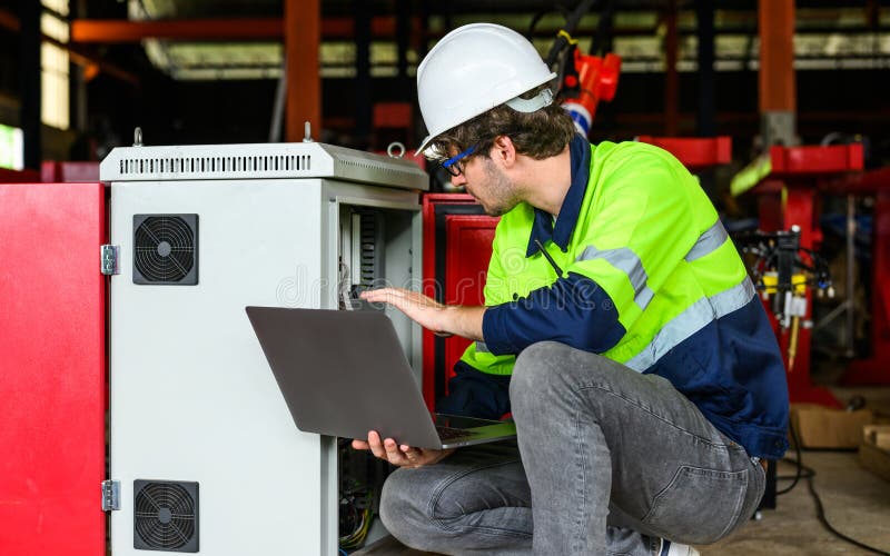 Engineer Foreman Checking and Inspecting Machine at Industrial Factory ...