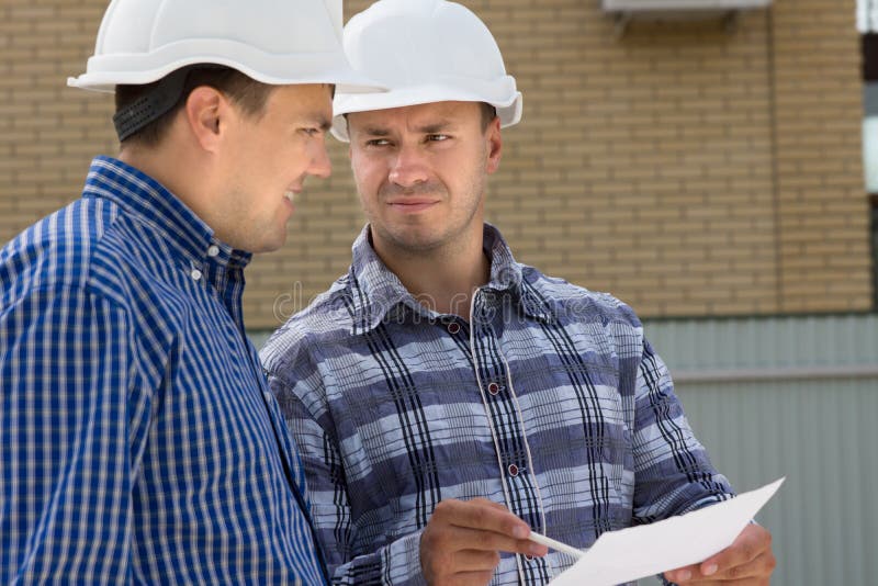 Engineer and Foreman at the Construction Site Stock Photo - Image of ...