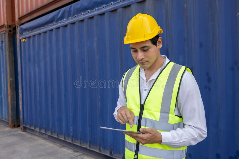 Engineer or Foreman Holding Tablet and Looking Down To Checking ...