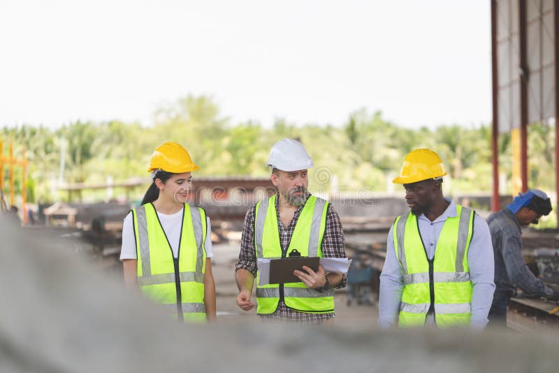 Engineer and Foreman Worker Team with Blueprints Checking Project at ...