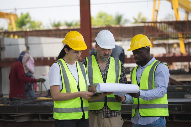 Engineer and Foreman Worker Team with Blueprints Checking Project at ...