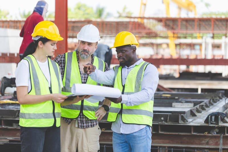 Engineer and Foreman Worker Team with Blueprints Checking Project at ...