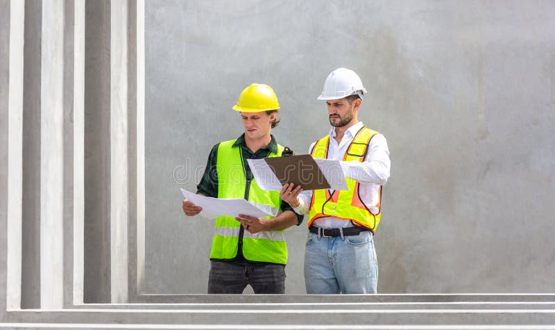 Engineer and Foreman Worker Team with Blueprints Checking Project at ...