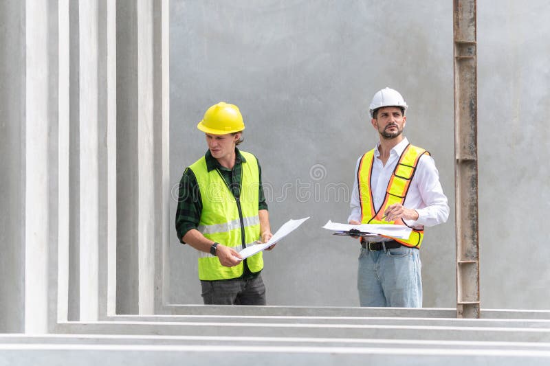 Engineer and Foreman Worker Team Inspect the Construction Site, Site ...