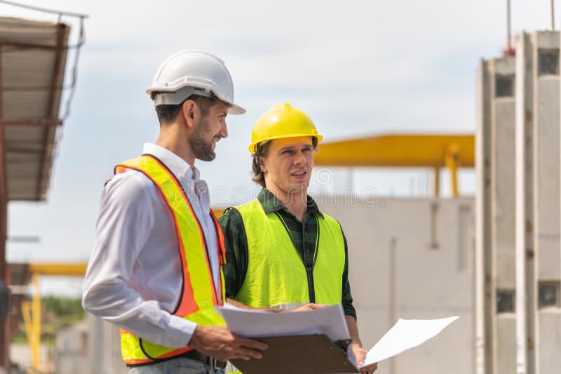 Engineer and Foreman Worker Team Inspect the Construction Site, Site ...