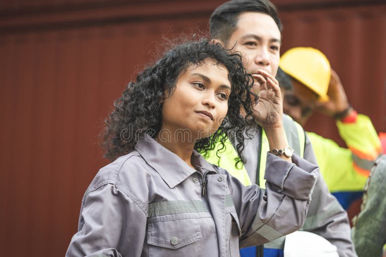 Engineer and Foreman Workers Team Working in Logistic Terminal of ...