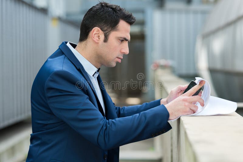 Engineer in Formal Wear Holding Blueprint Stock Photo - Image of ...
