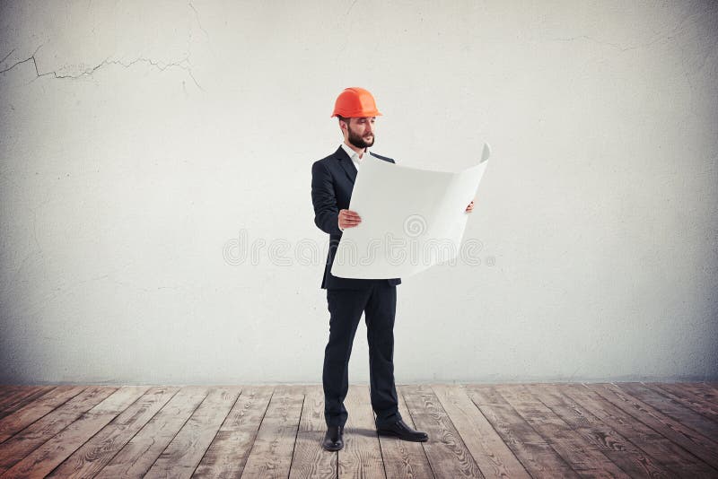 Engineer in a Formal Wear Looking Blueprints Stock Image - Image of ...