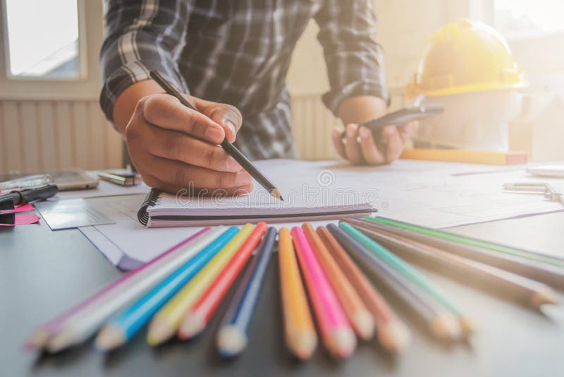 The Engineer is Giving Advice and Consulting with the Designer To Find ...