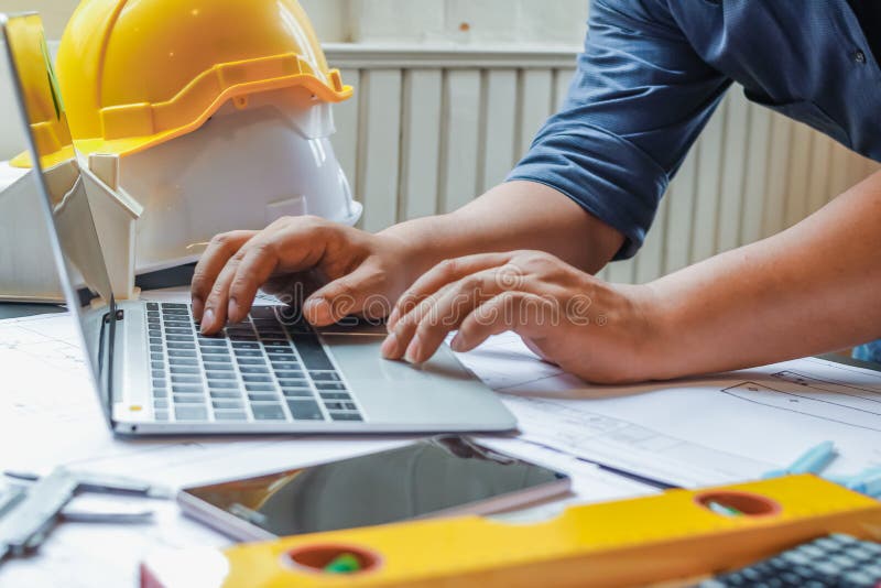 The Engineer is Giving Advice and Consulting with the Designer To Find ...